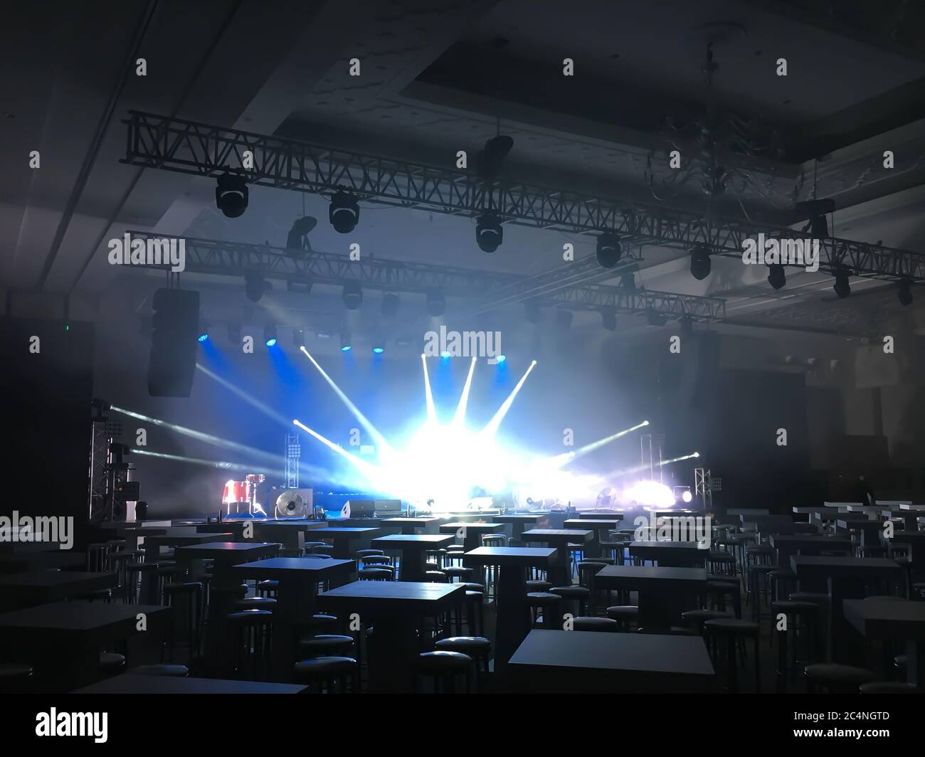 Rehearsal in big concert hall with a performance stage with led screen ...