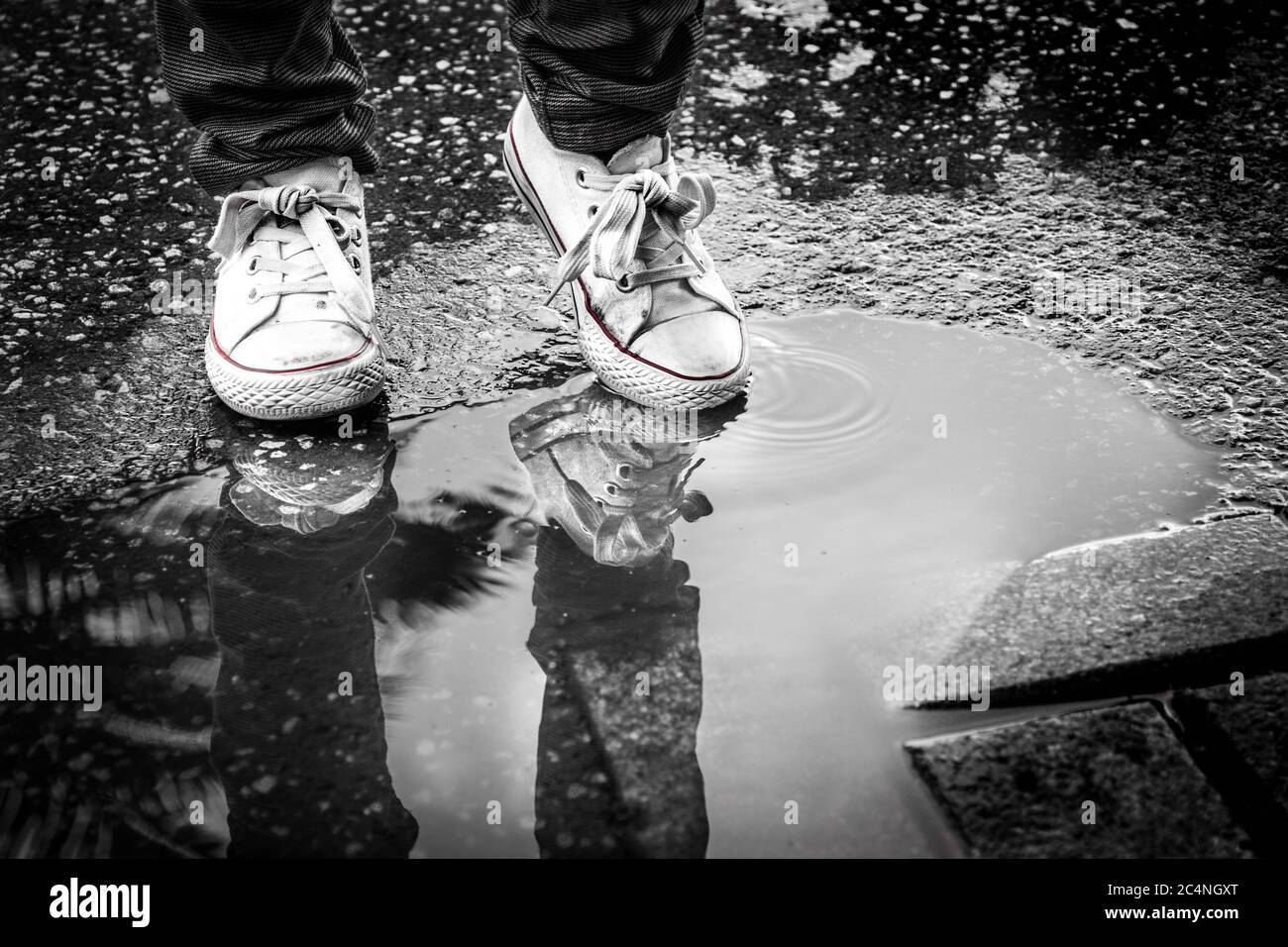 Man Standing In Puddle And Street High Resolution Stock Photography and ...