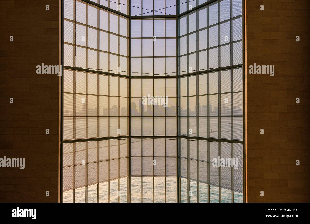 Doha city sunset views through the large windows of the Museum of ...