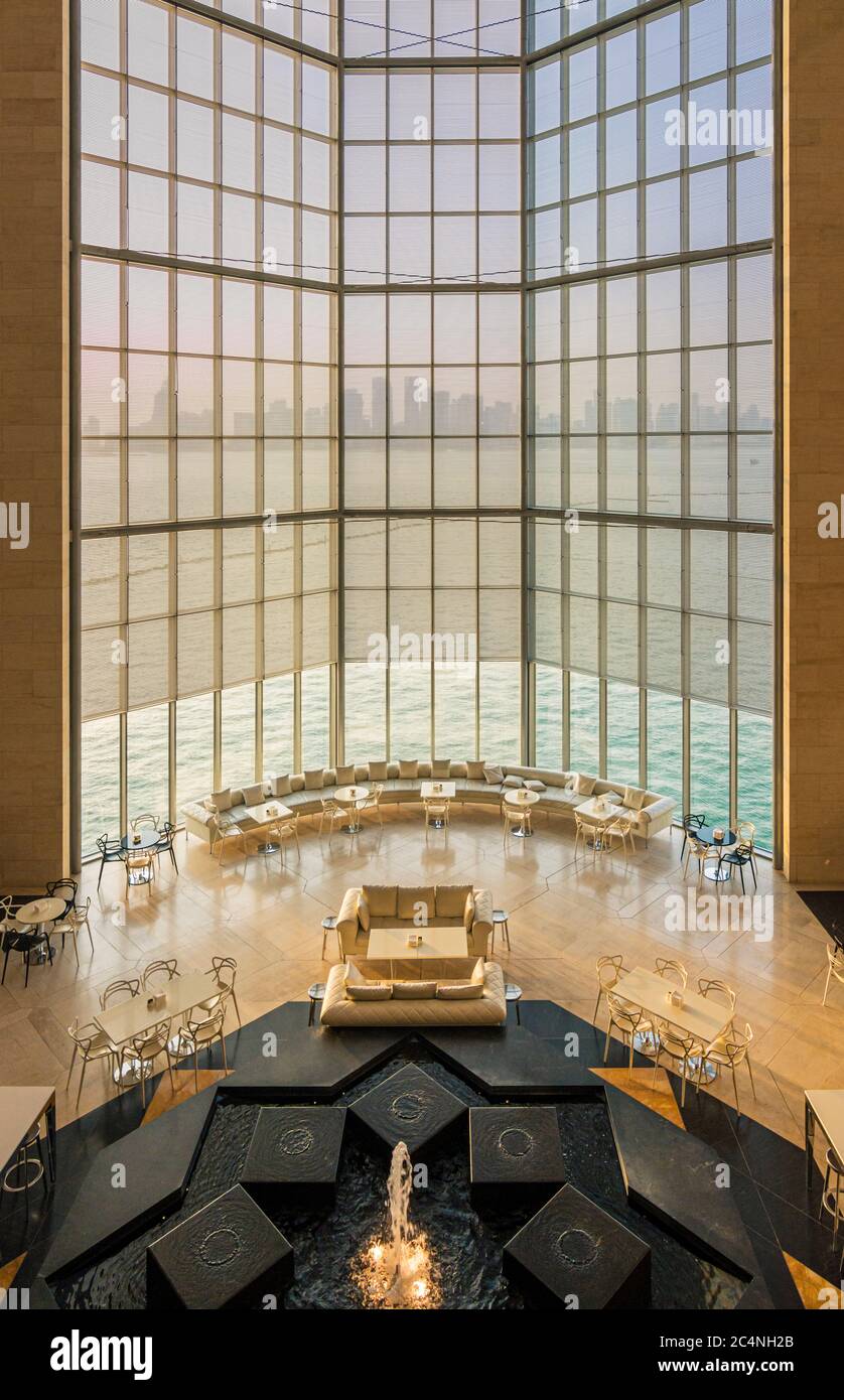 Doha city sunset views through the large windows of the Museum of ...