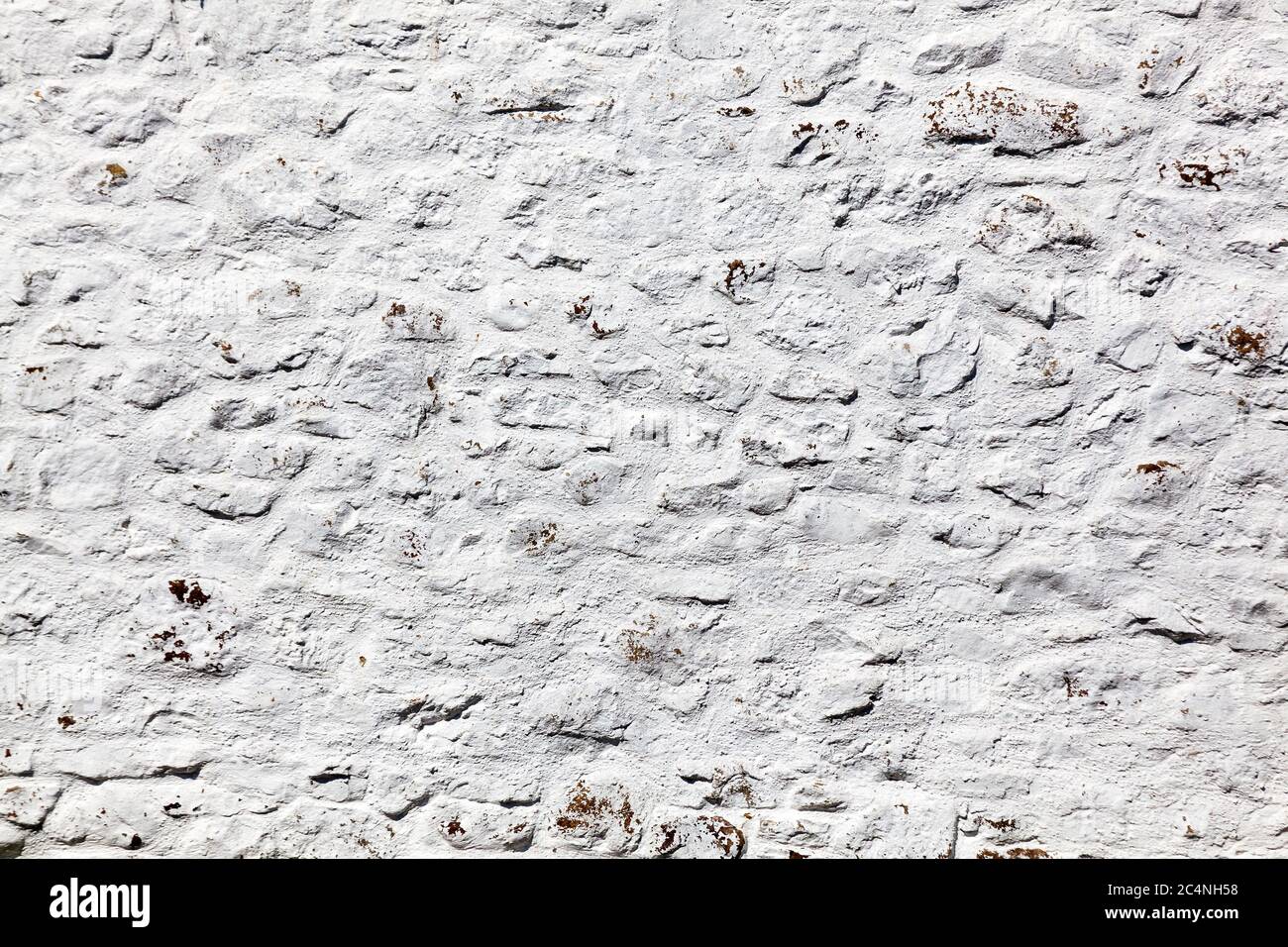 Old grey white weathered rough stone wall texture background Stock ...