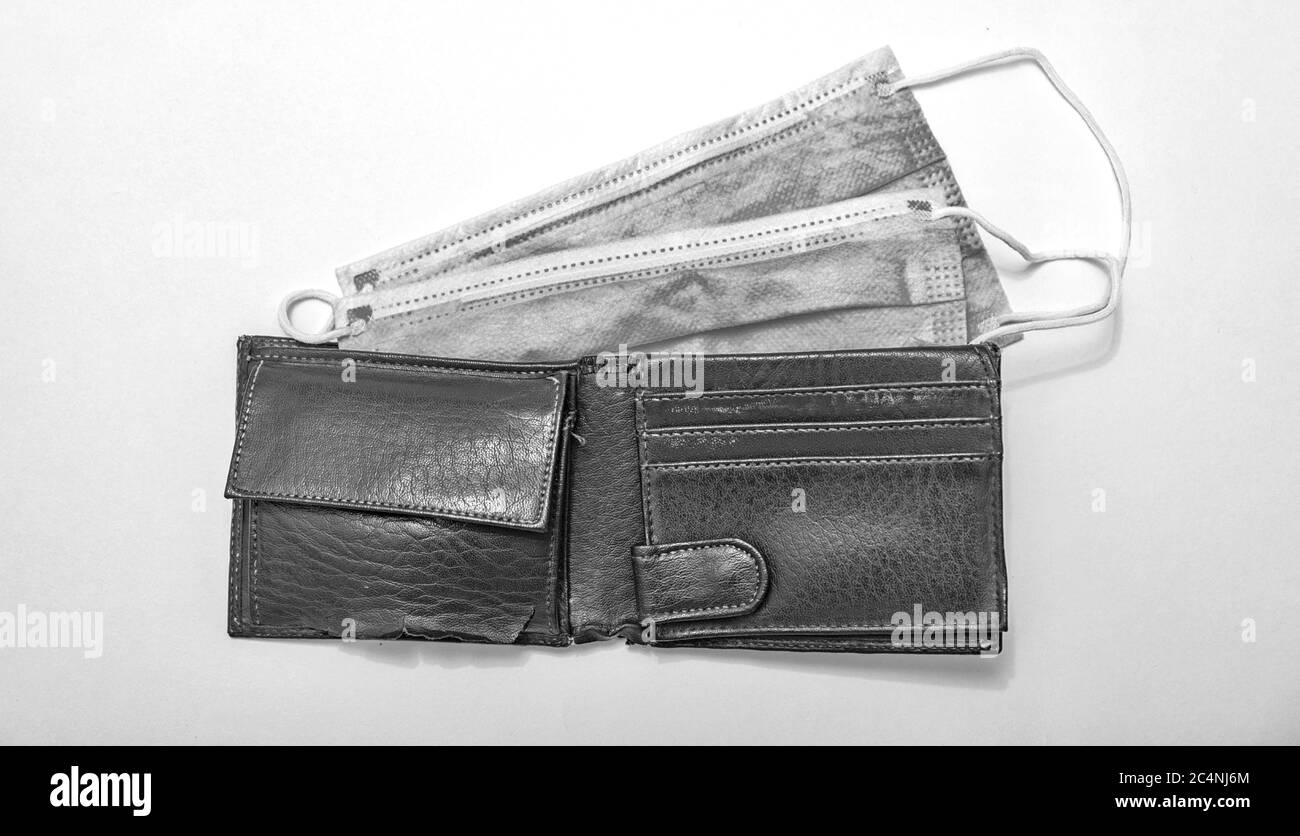 Surgical blue face masks in a wallet. The high value of face masks ...