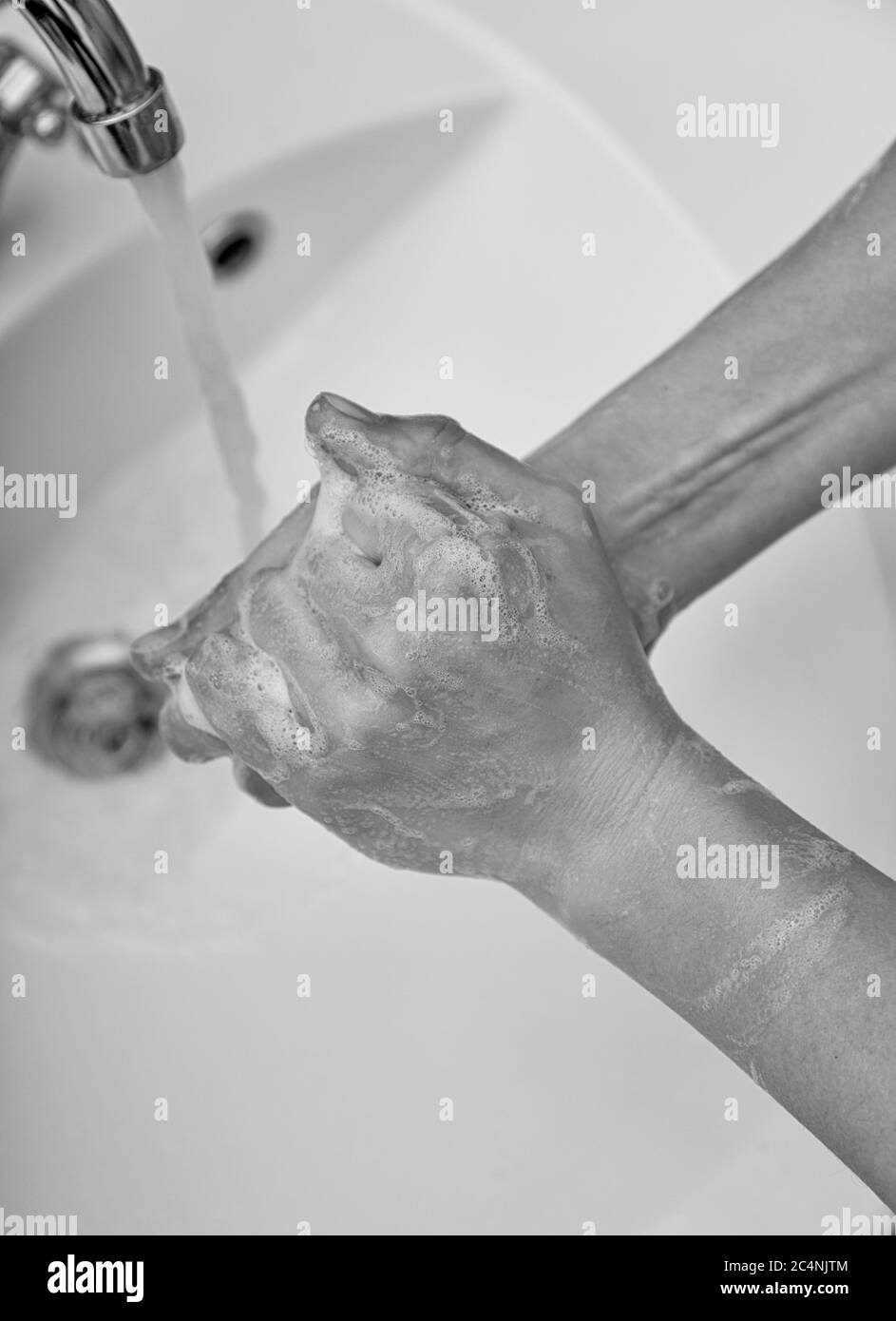 Person lathering soap washing hands hi-res stock photography and images ...