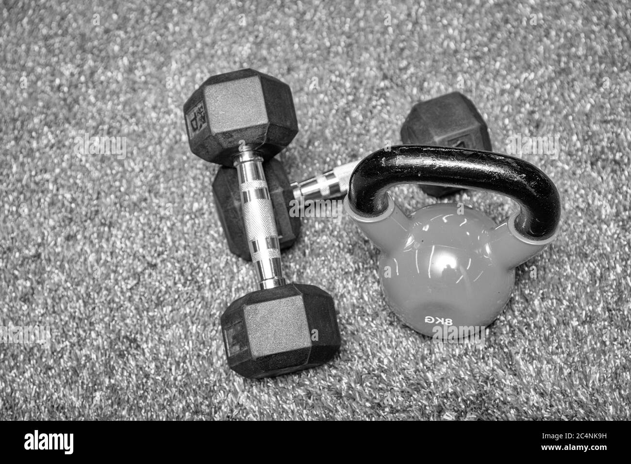 Gym equipment on grass background. Concept preparing to fitness sports ...