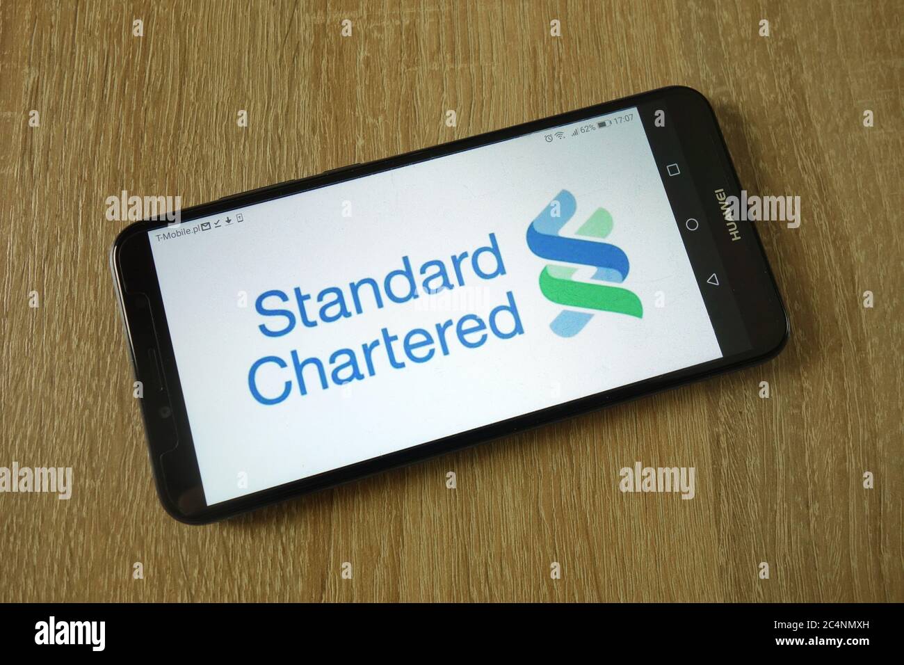 Standard Chartered PLC logo displayed on smartphone Stock Photo - Alamy