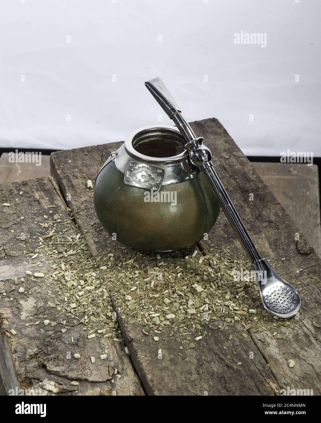 Traditional Argentinian yerba mate tea on top of an old wooden planks ...