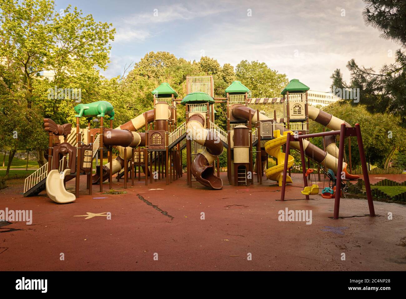 a big toy tunnel sliders in the playground, park without people Stock ...
