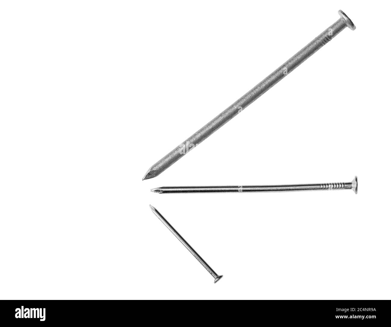 Three assorted nails. Isolated on white. Pointing at something Stock ...
