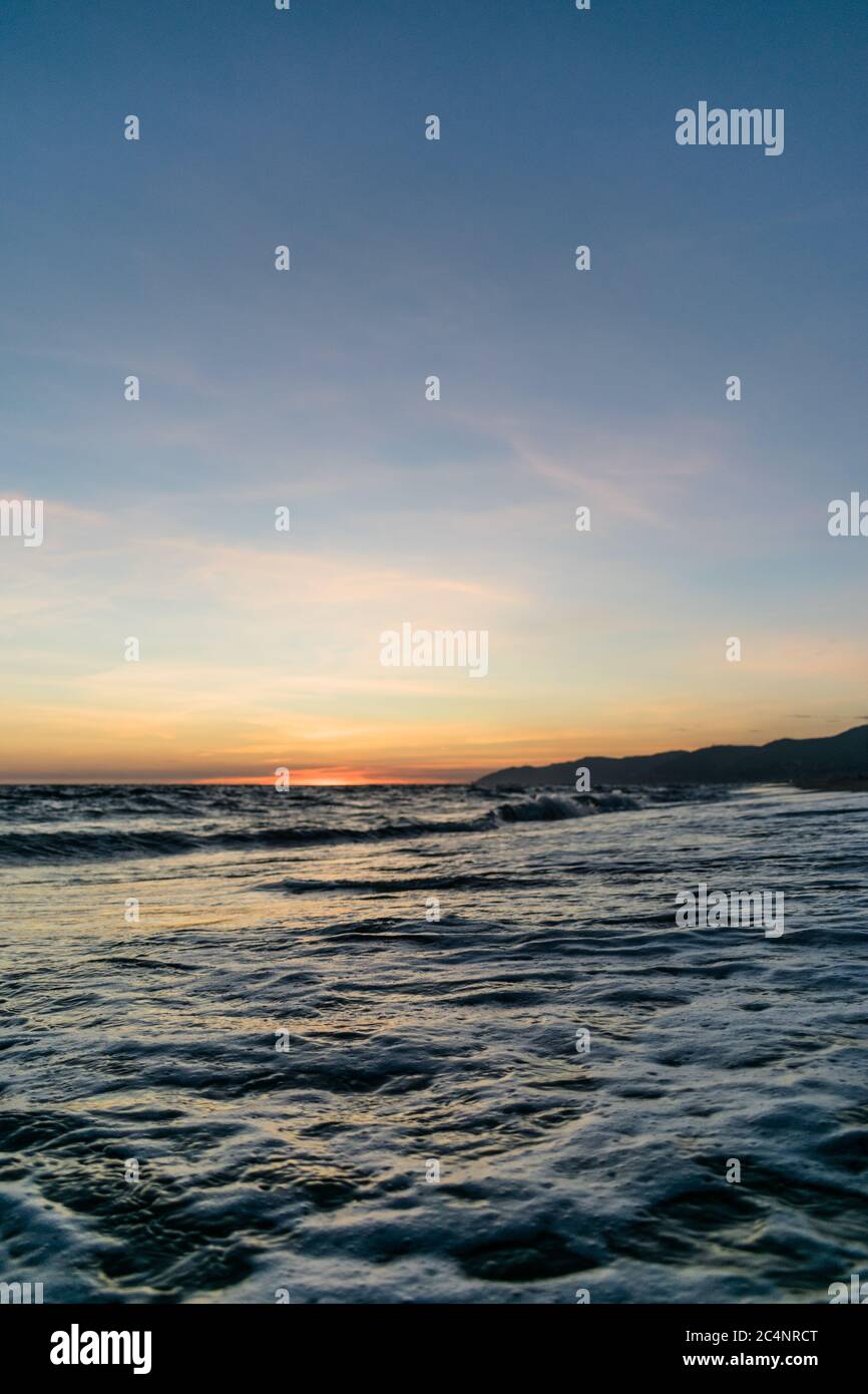 Low view of the sea in sunset Stock Photo - Alamy