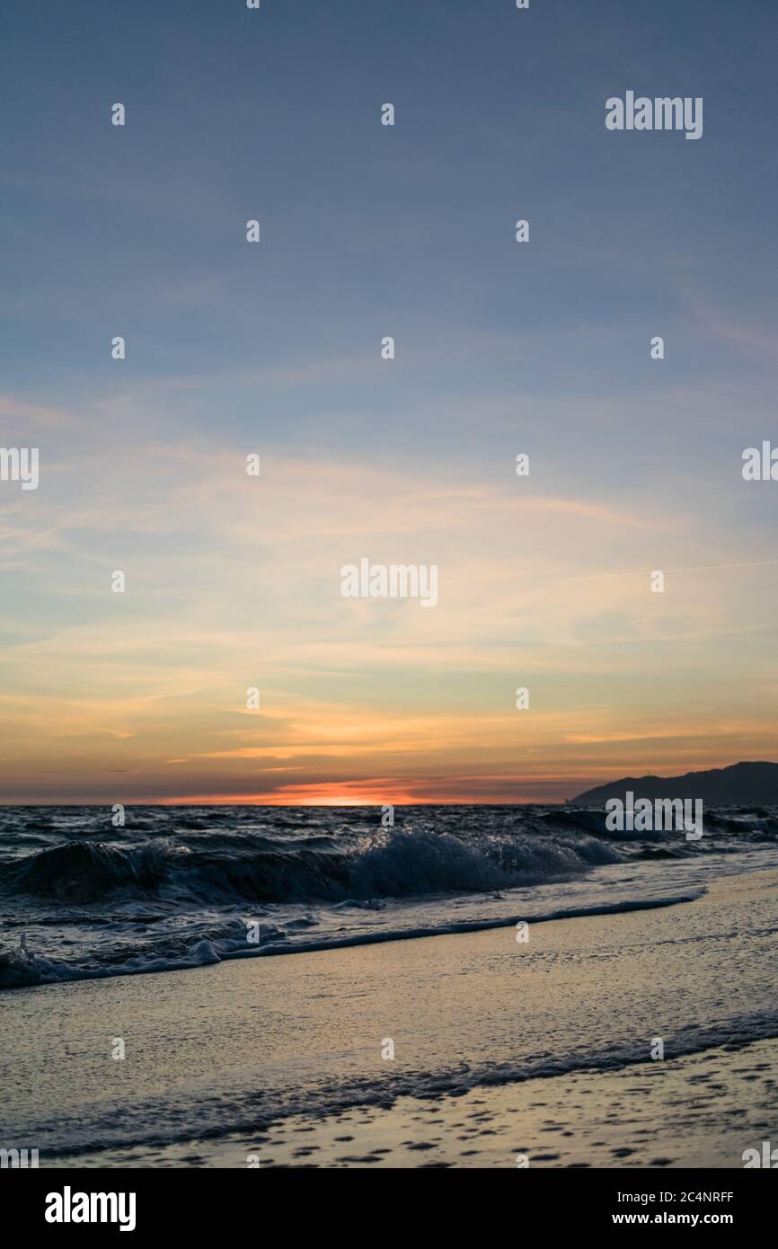 Low view of the sea in sunset Stock Photo - Alamy
