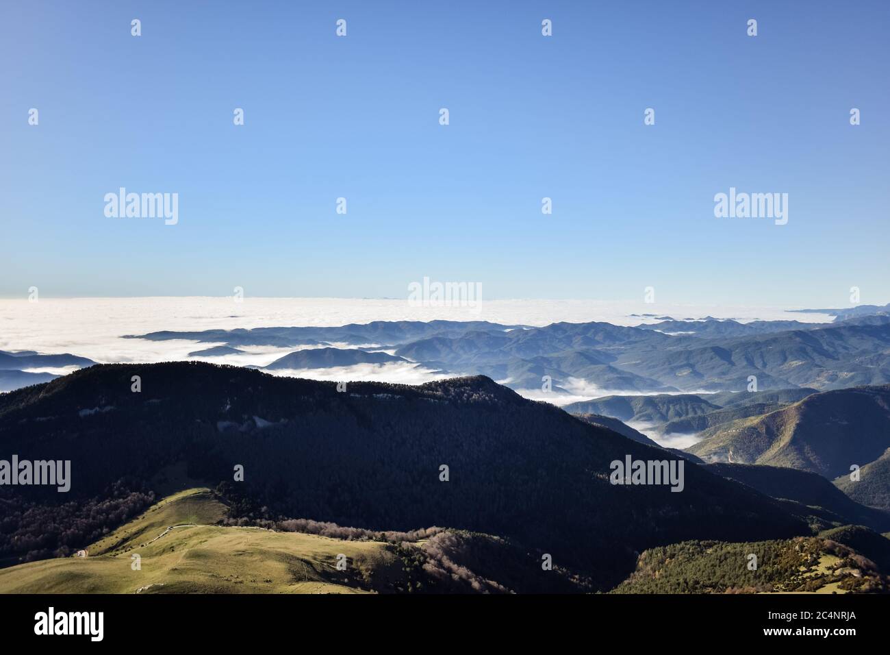 Panoramic view from the peak of a mountain Stock Photo - Alamy