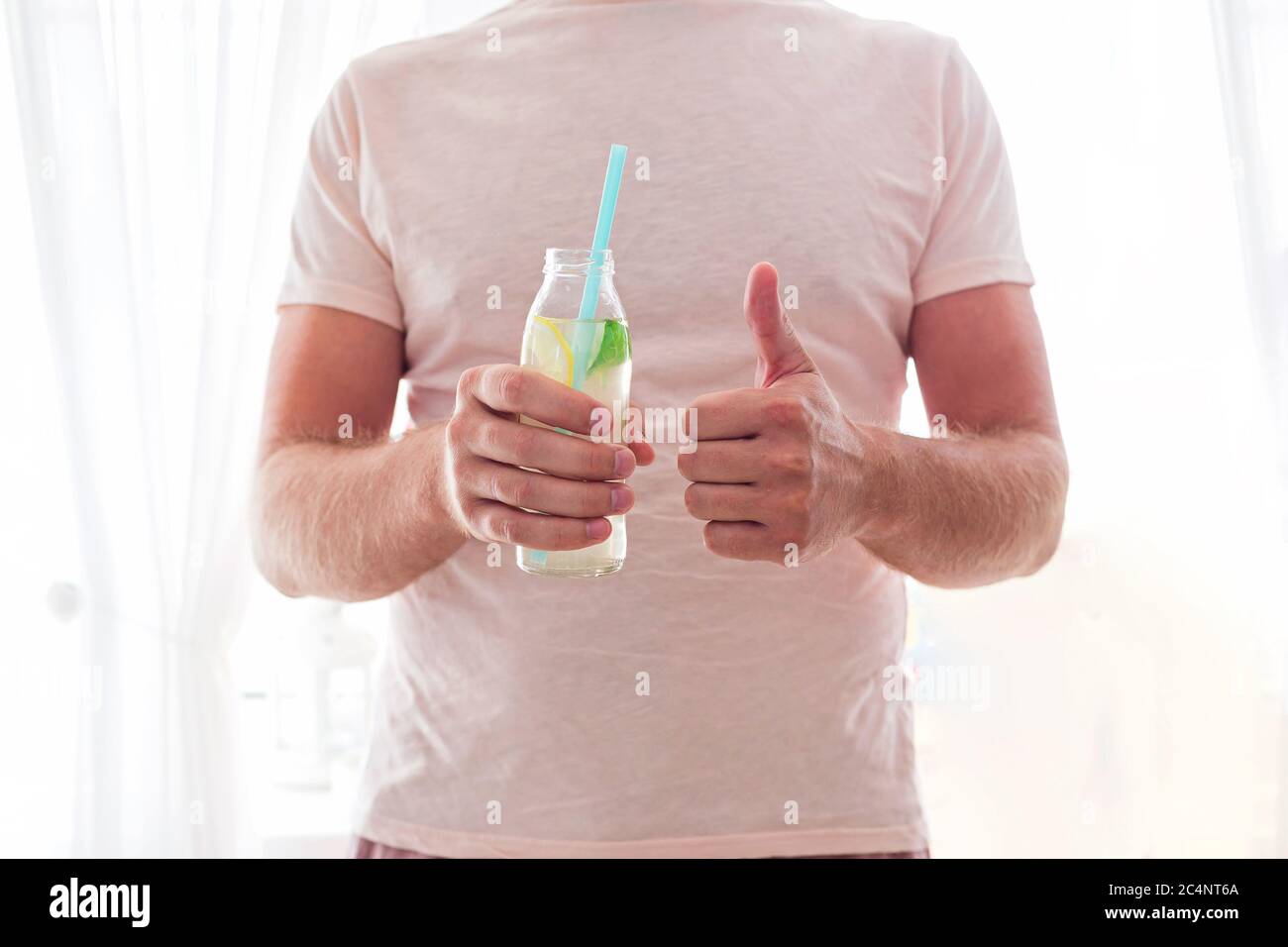 Man drink through a straw hi-res stock photography and images - Alamy