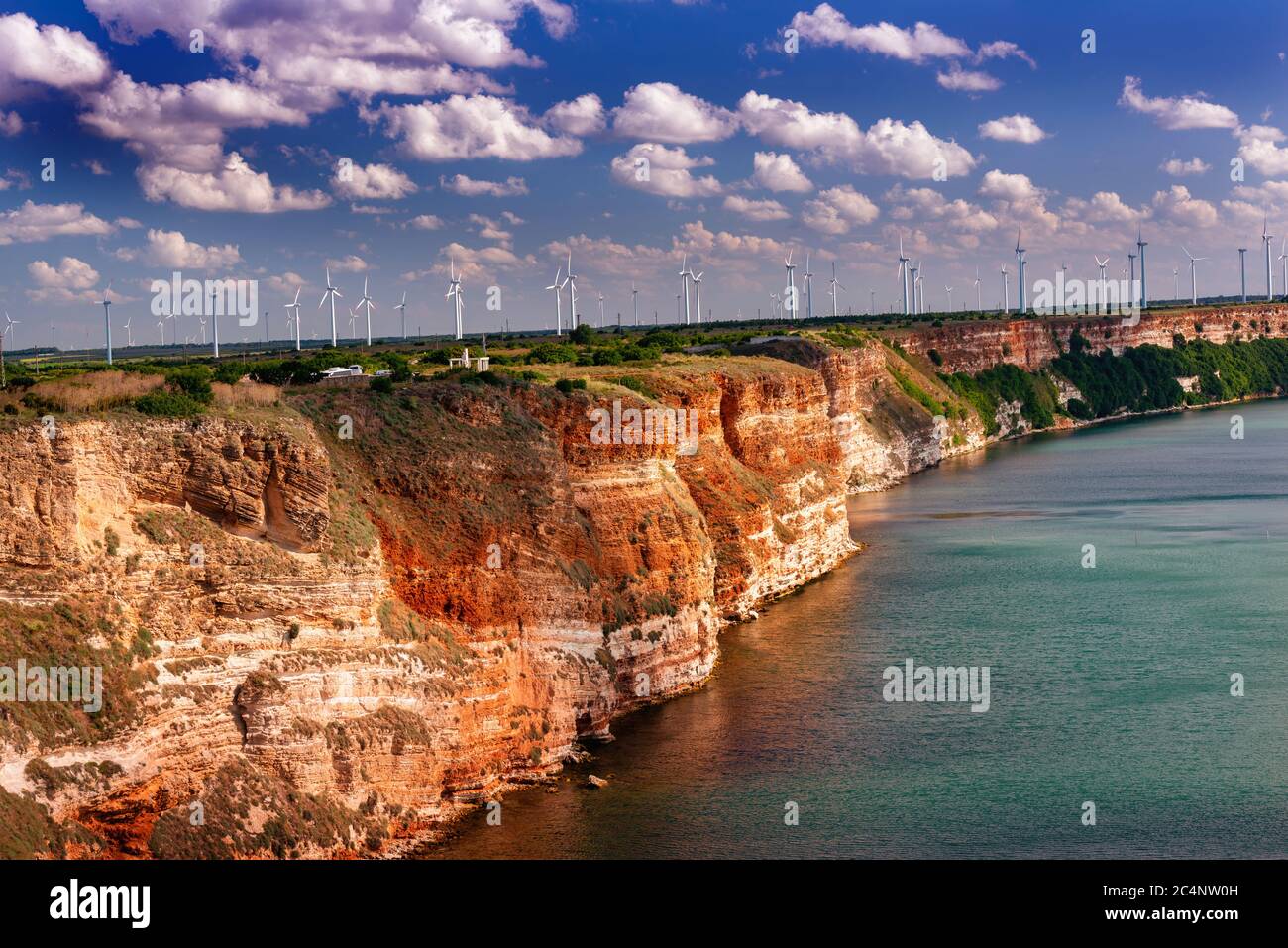 the rocks on the beach on a beautiful summer day and the sky is blue ...