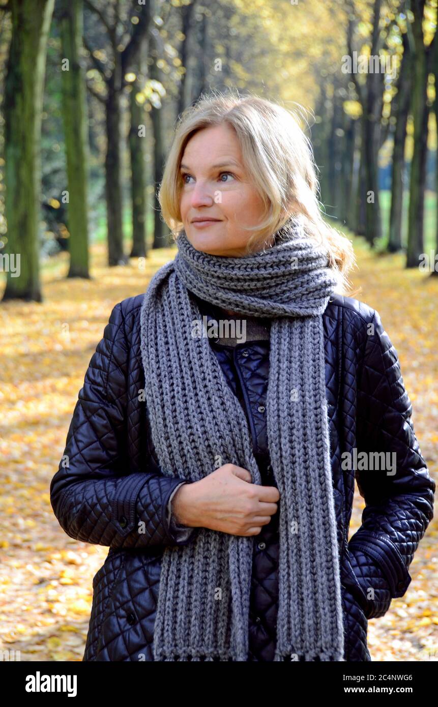 middle aged woman enjoy the nature during a walk Stock Photo - Alamy