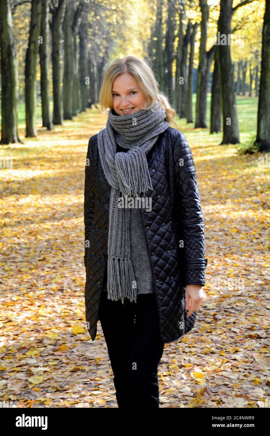middle aged woman enjoy the nature during a walk Stock Photo - Alamy