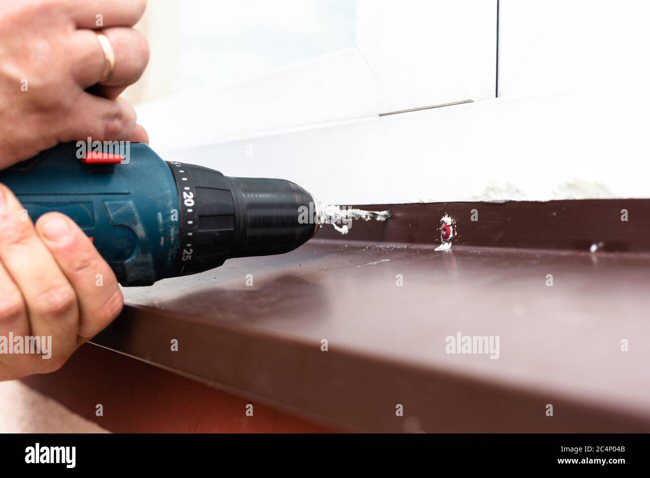 Construction work - drilling holes Stock Photo - Alamy