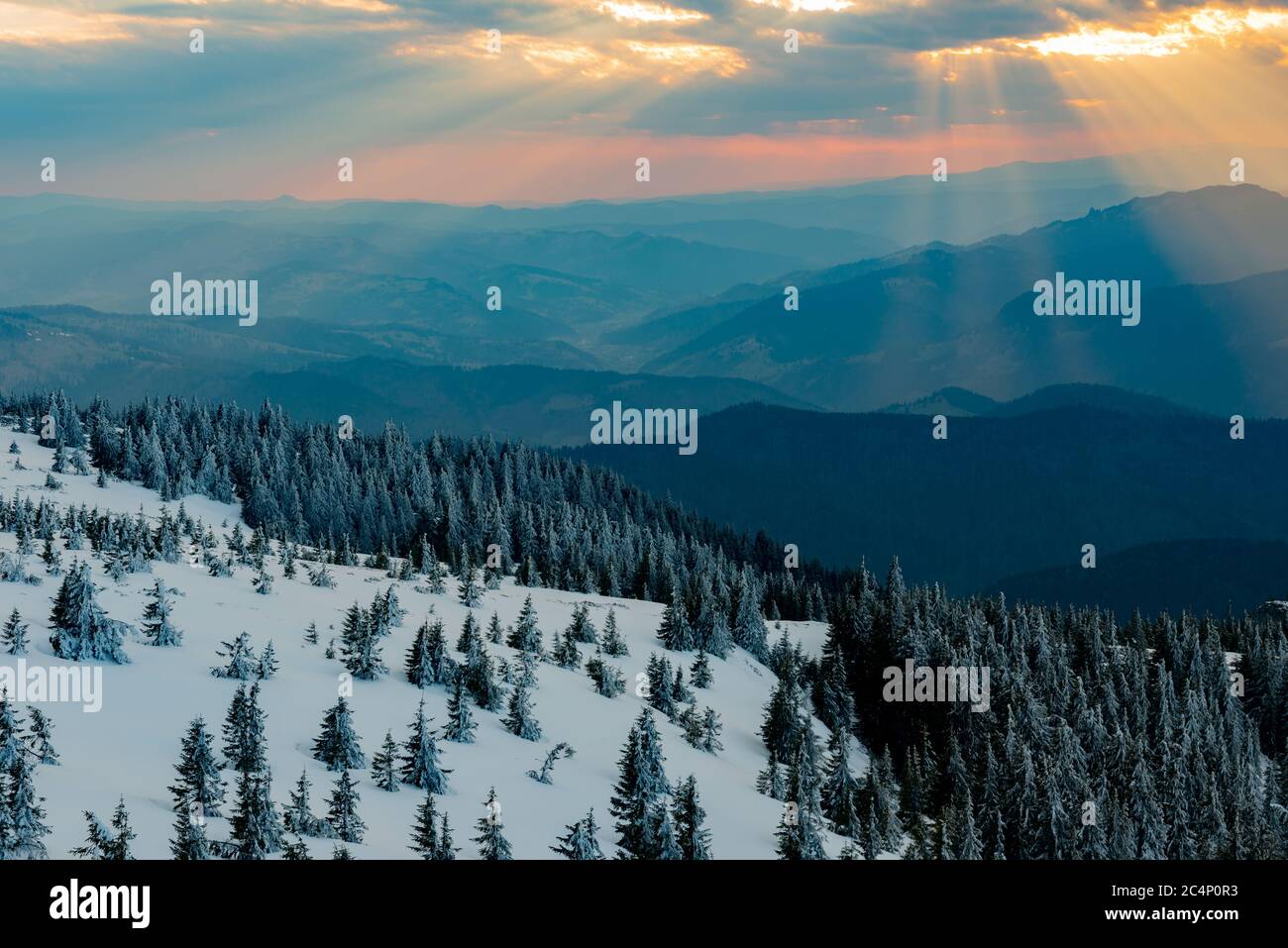 rocky mountains full of snow and villages in the valley Stock Photo - Alamy