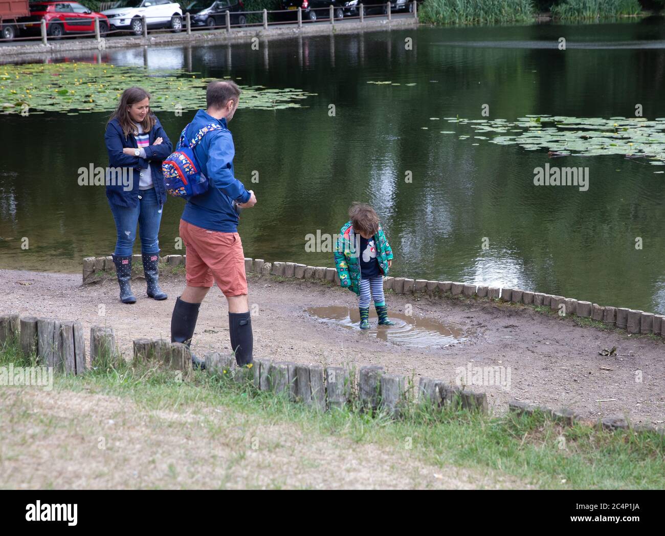 Children paddling in wellies or gum boots hi-res stock photography and ...