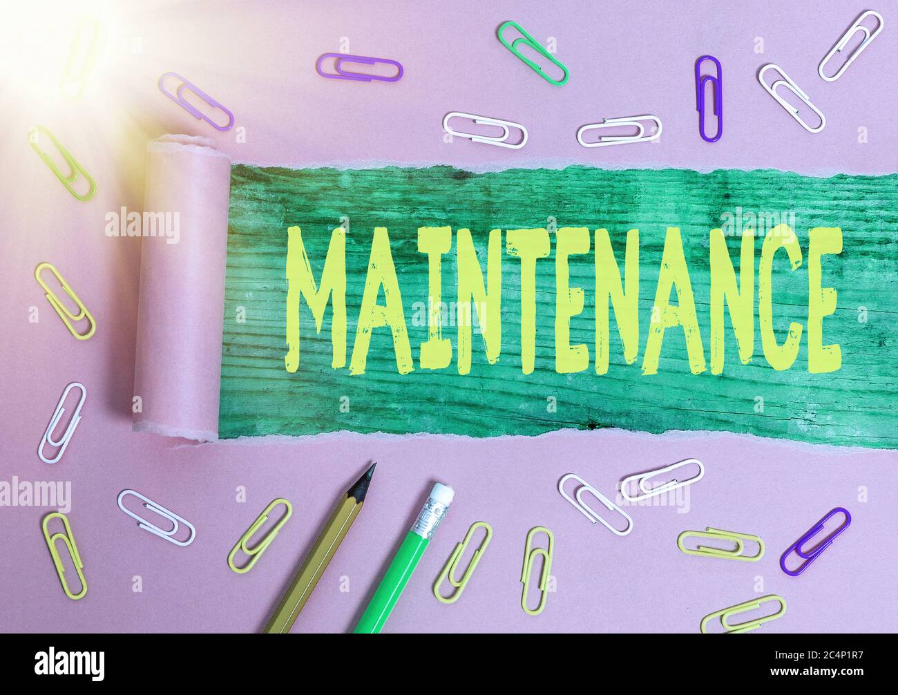 Writing note showing Maintenance. Business concept for method of ...