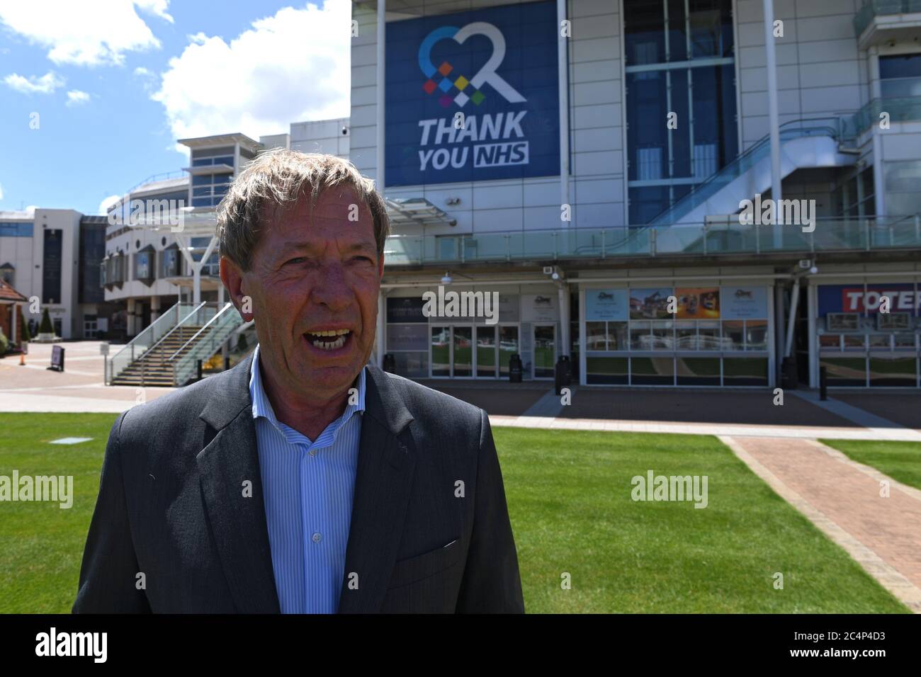 Commentator Derek Thompson on way to commentary position in the grand ...