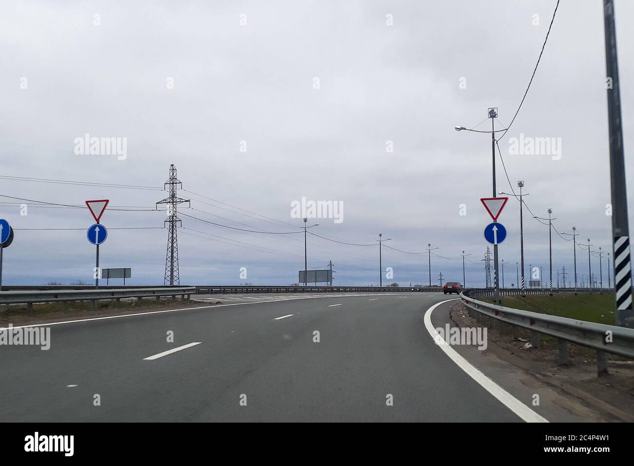 A road or a highway, the highway stretches to the horizon. View from ...