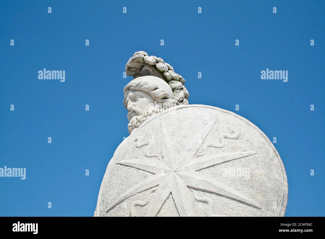 Como, Lombardy, Italy. One of the marble statues representing pagan ...