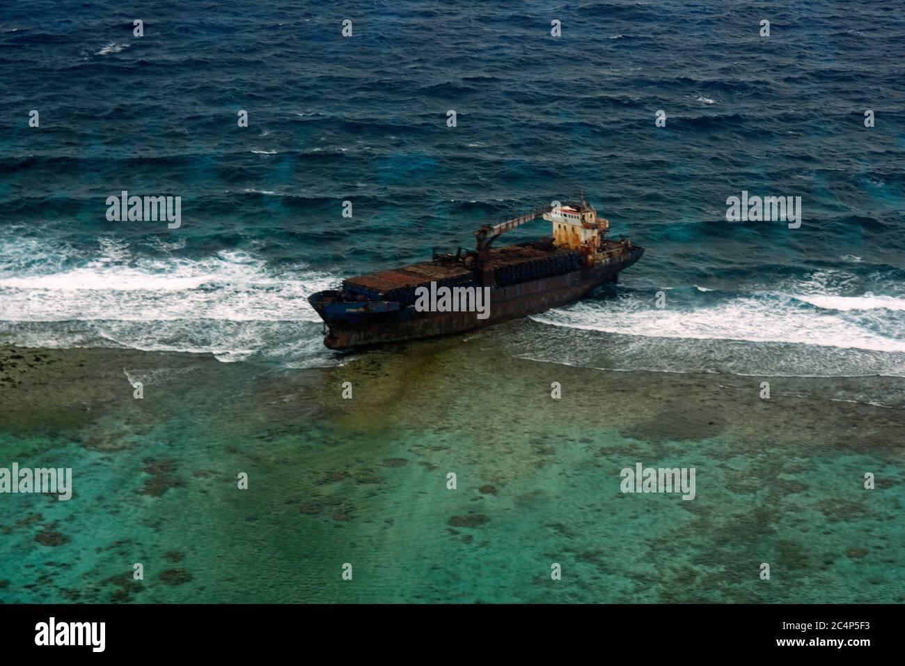 Aerial view of a freighter shipwreck, Lighthouse Reef Atoll, Belize ...