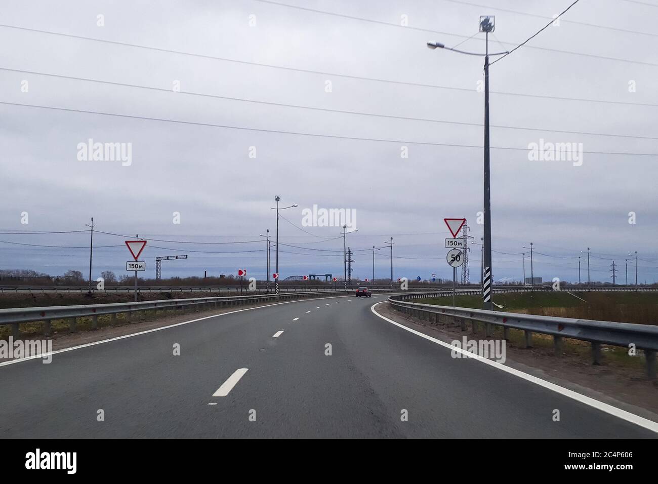 A road or a highway, the highway stretches to the horizon. View from ...