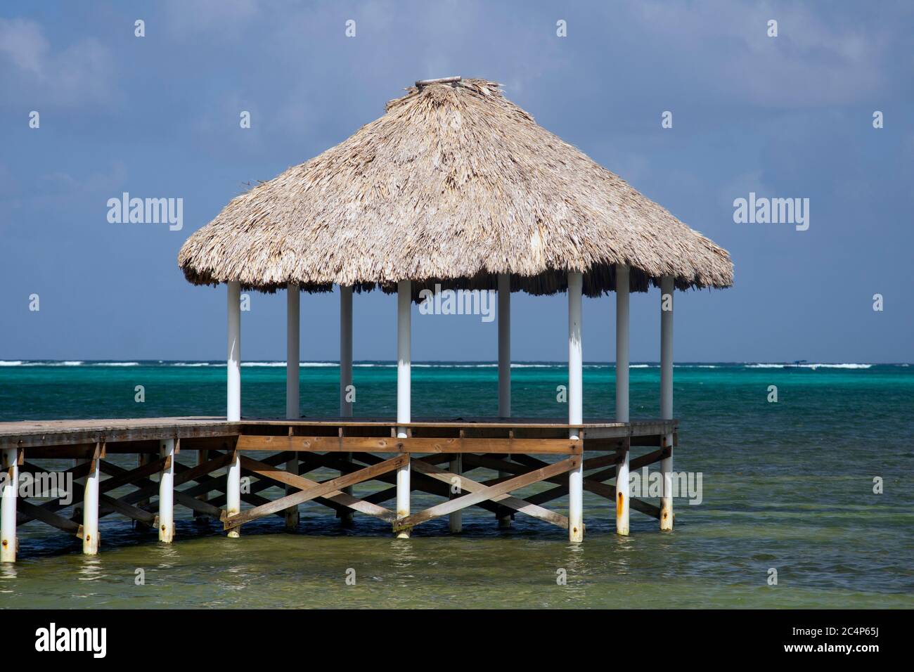 A palapa in the Caribbean sea at San Pedro Beach, San Pedro, Ambergris ...