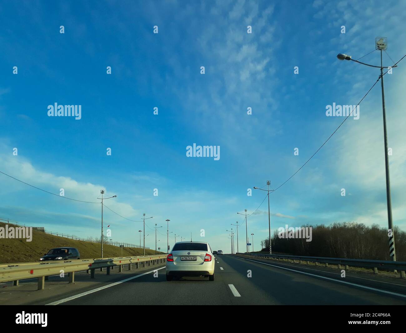 A road or highway leading to the horizon. View from the car window ...