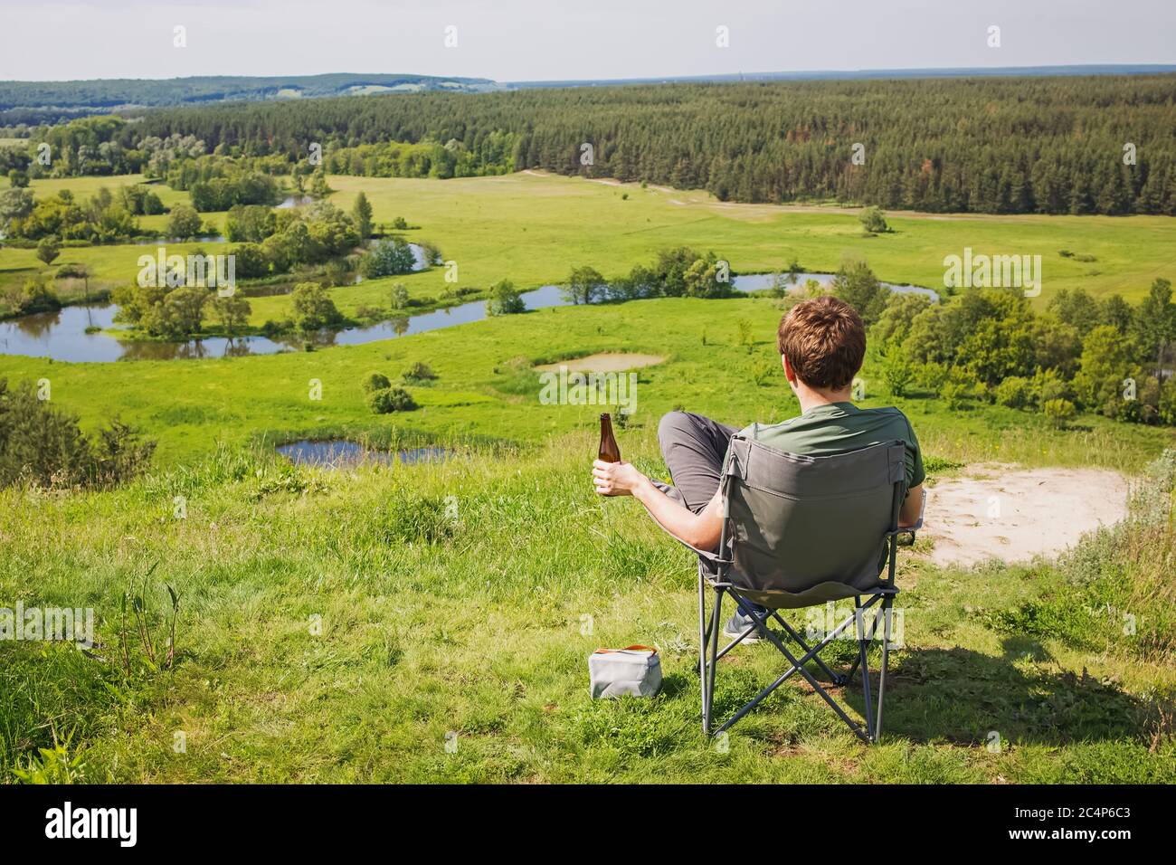 Man resting chair back view hi-res stock photography and images - Alamy
