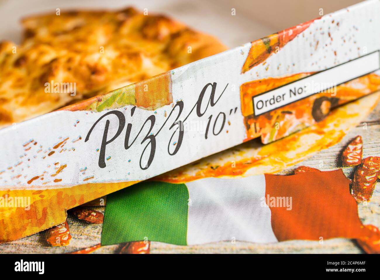 Italian flag seen on a pizza box in a close up of a takeaway Stock ...