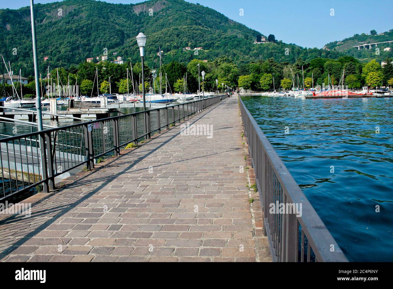 Como, Lombardy, Italy. Lake of Como. The Caldirola breakwater that ...