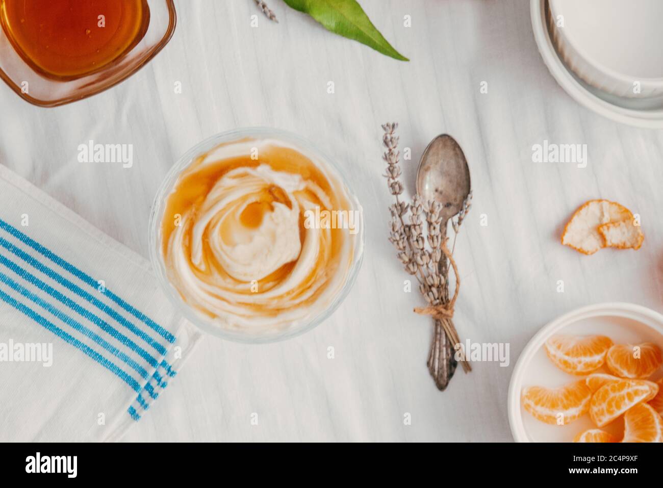 Greek yogurt with honey dessert. yogurt with honey, orange, and ...