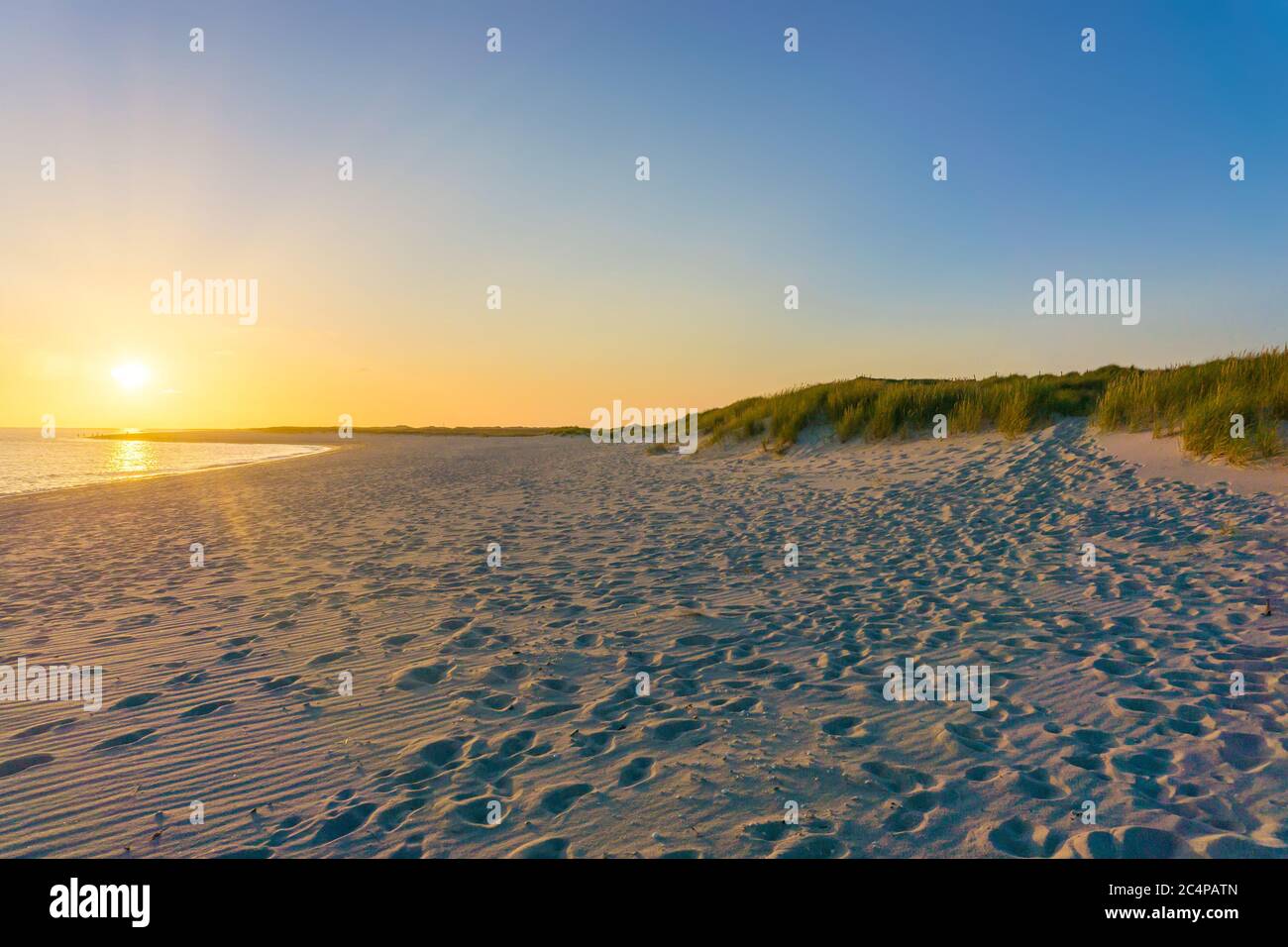 Sunset on a empty Beach on the island Sylt Stock Photo - Alamy