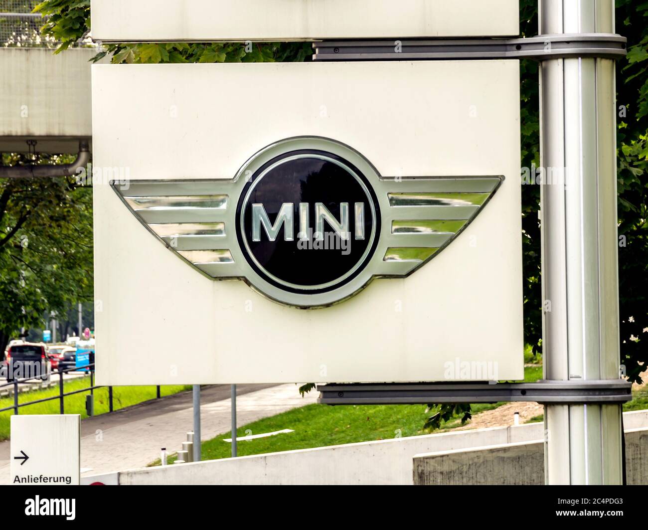 Munich, Germany : Mini Cooper cars dealer logo in front of the building ...