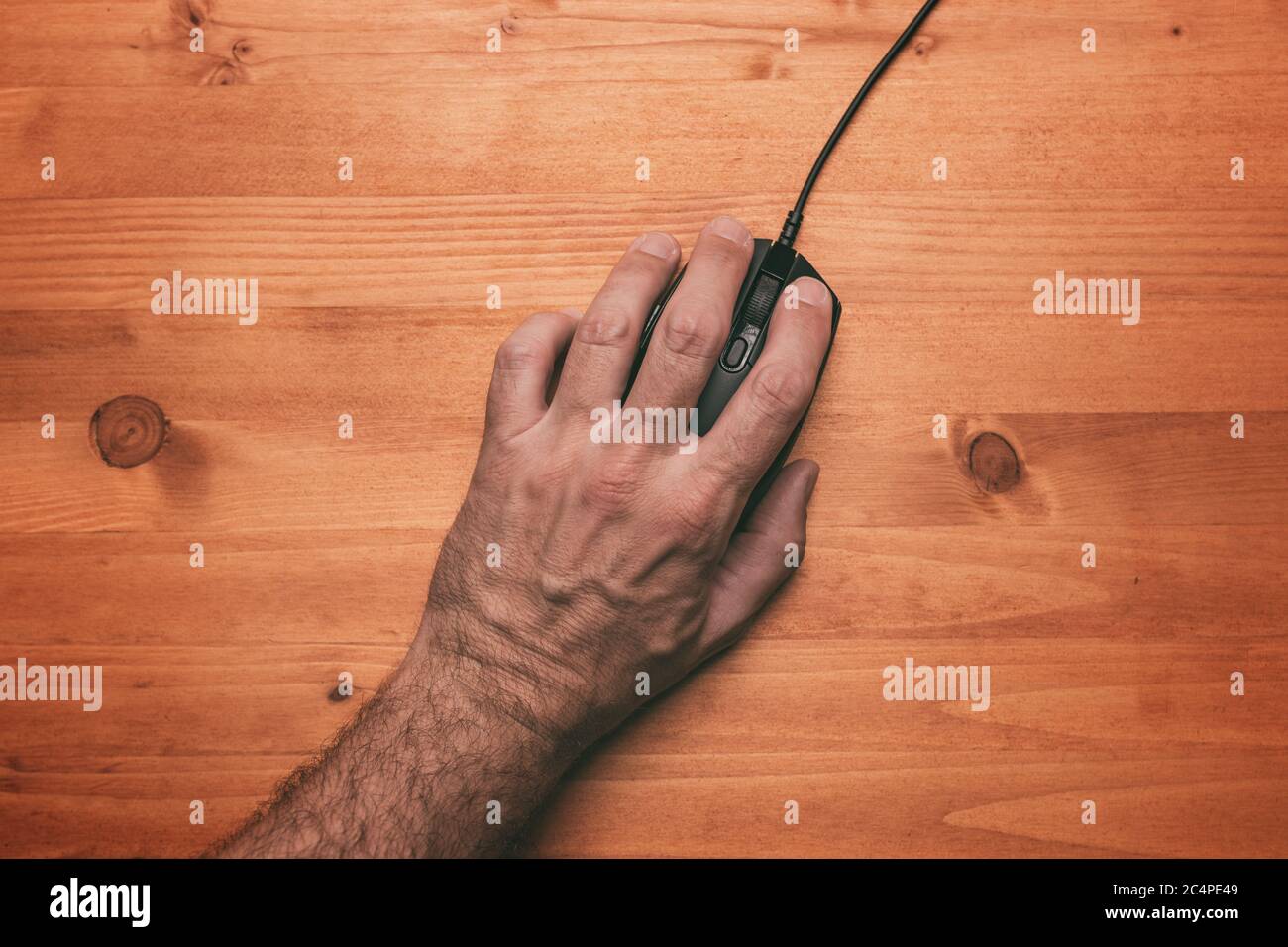 Hand man above computer hi-res stock photography and images - Alamy
