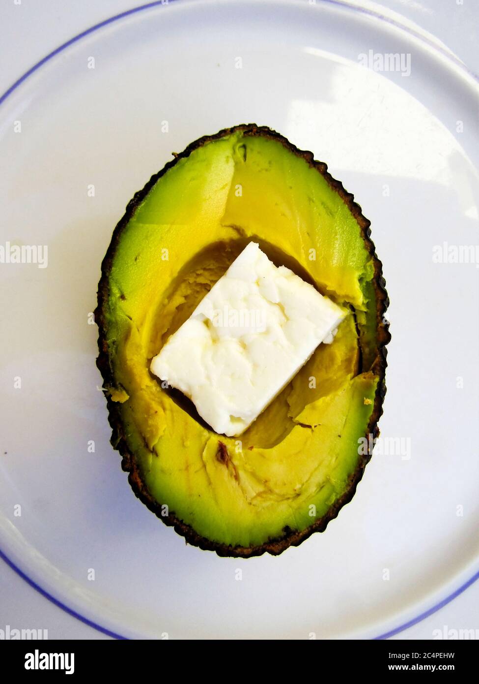 Avocado with Feta Cheese, Crete, Greece Stock Photo - Alamy