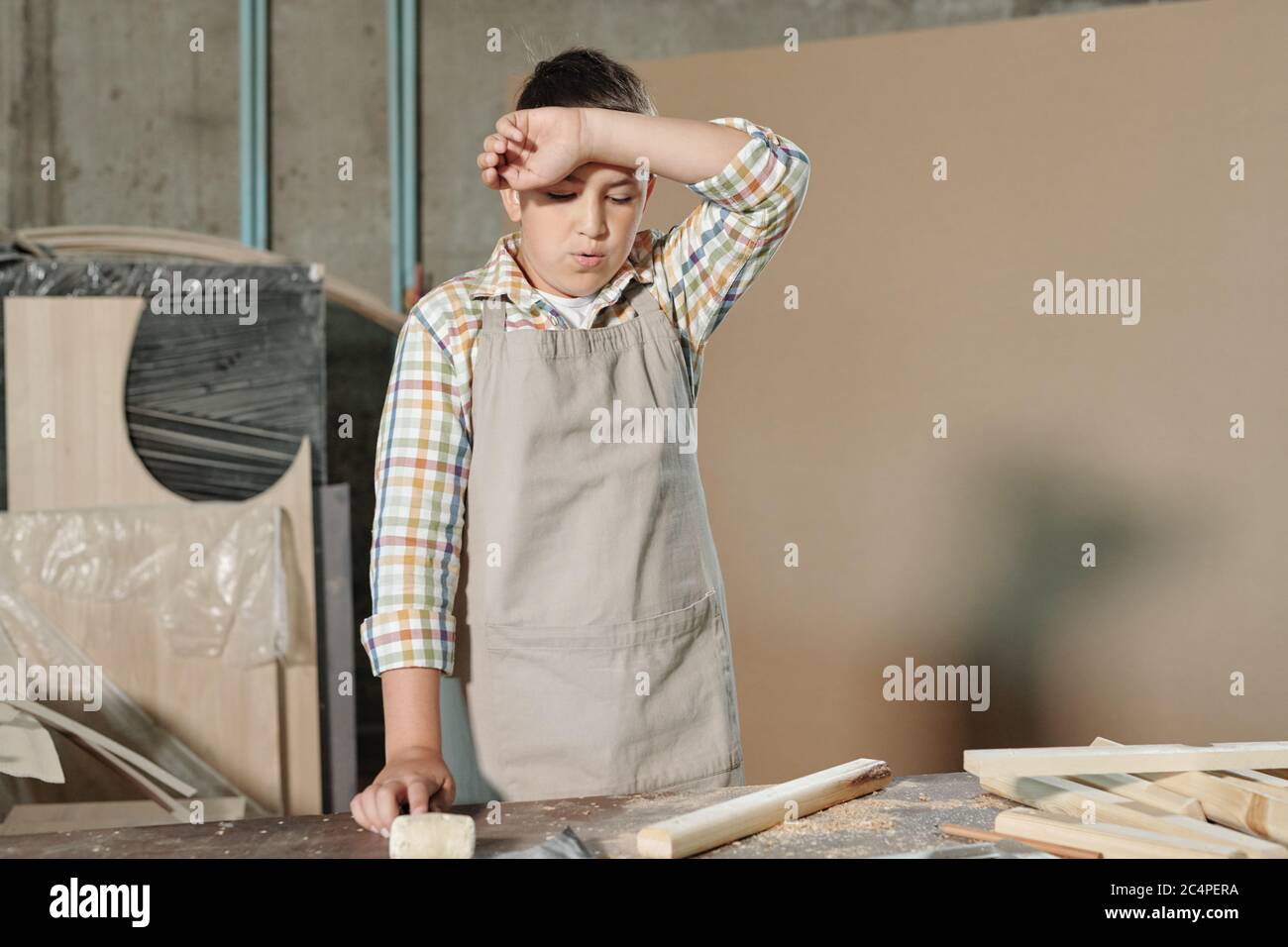Child wiping sweat hi-res stock photography and images - Alamy