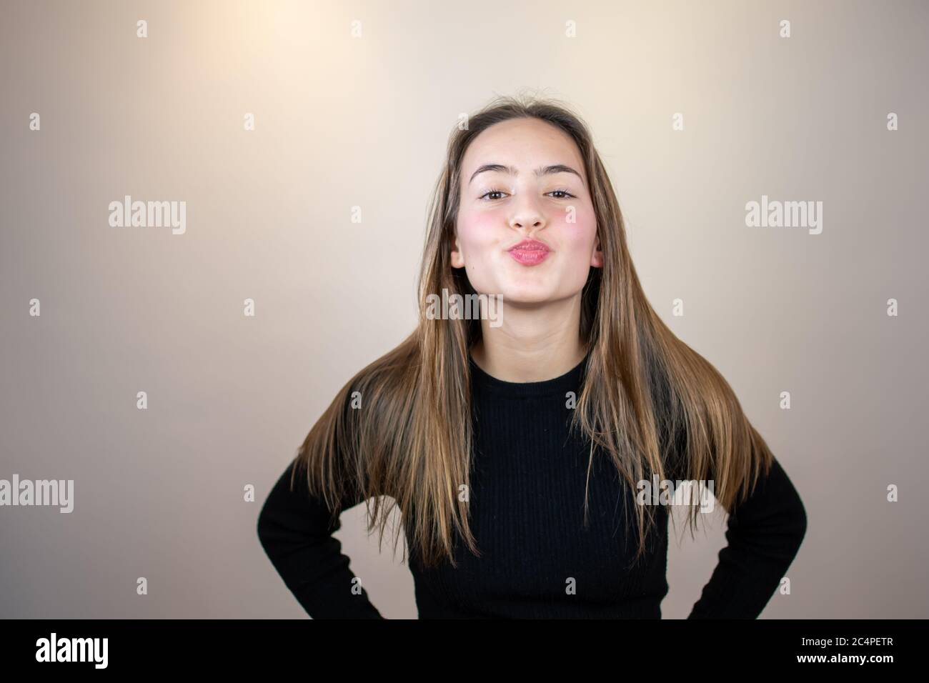 Girl kissing to camera Stock Photo - Alamy