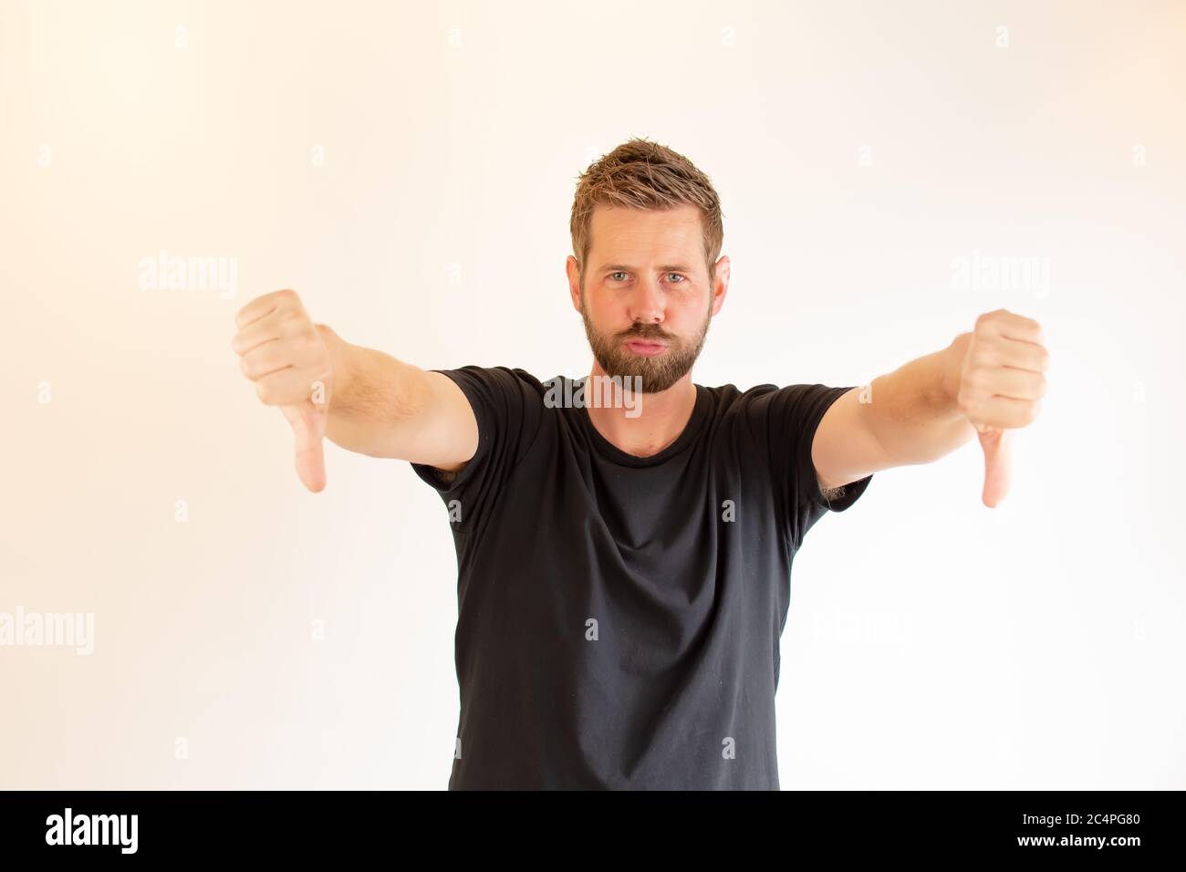 Thinking man two fingers hi-res stock photography and images - Alamy