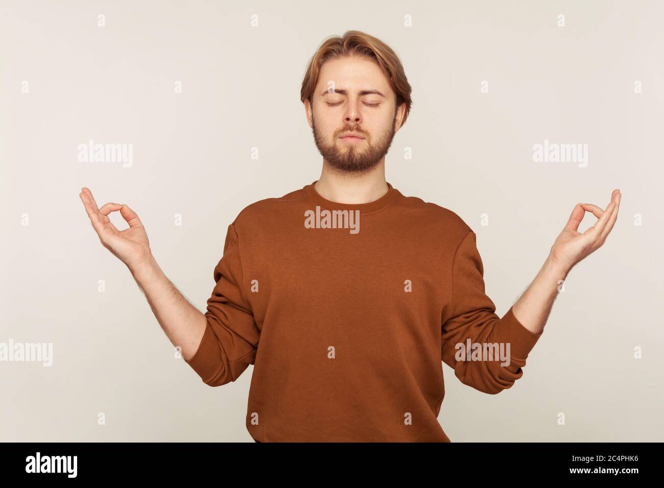 Balanced mind, relaxation. Portrait of peaceful man with beard in ...