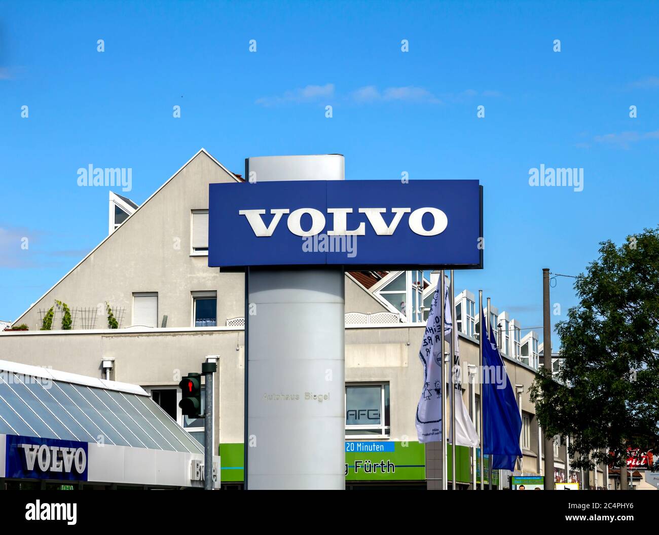 FURTH, GERMANY: Volvo dealership sign against the blue sky. Volvo is a ...