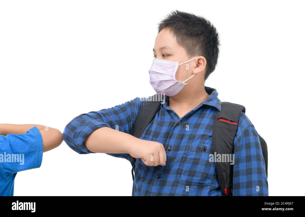 Elbow bump. New normal greeting to avoid the spread of coronavirus. Two ...