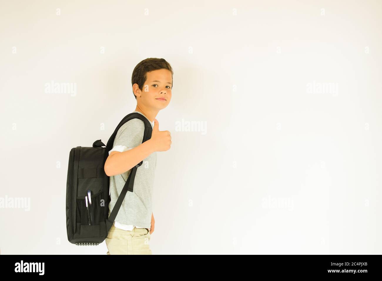 Young happy boy going to school Stock Photo - Alamy