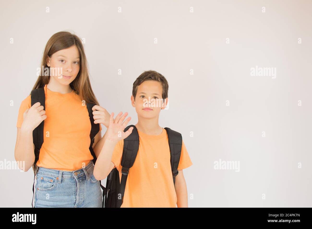 Boy and girl ready for school Stock Photo - Alamy