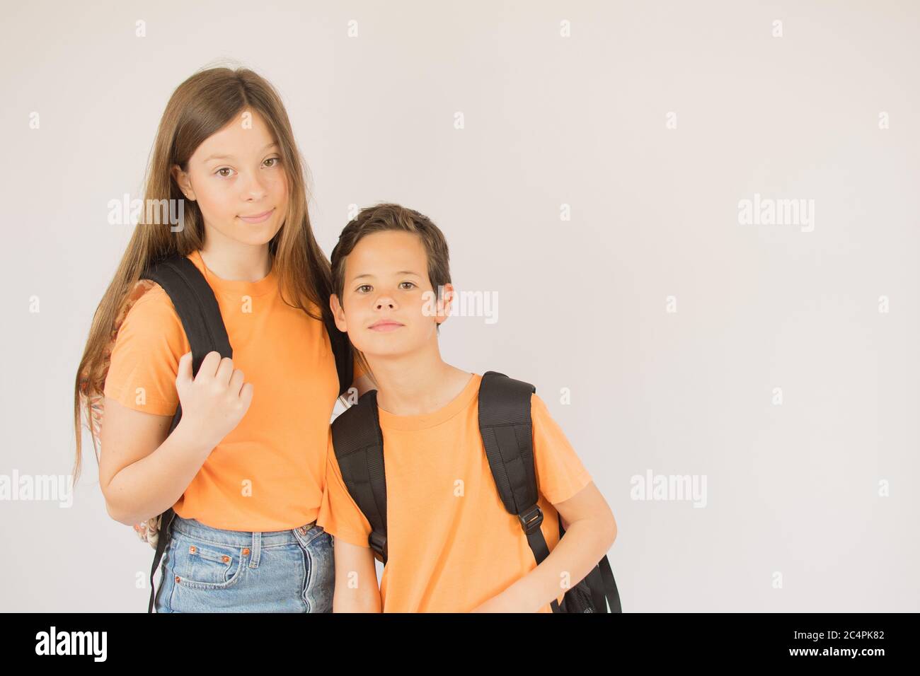Boy and girls ready for school Stock Photo - Alamy