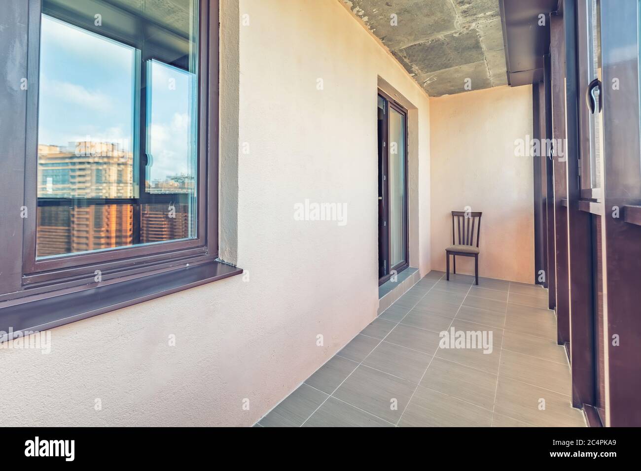 Small old common open balcony interior in high residential apartment ...