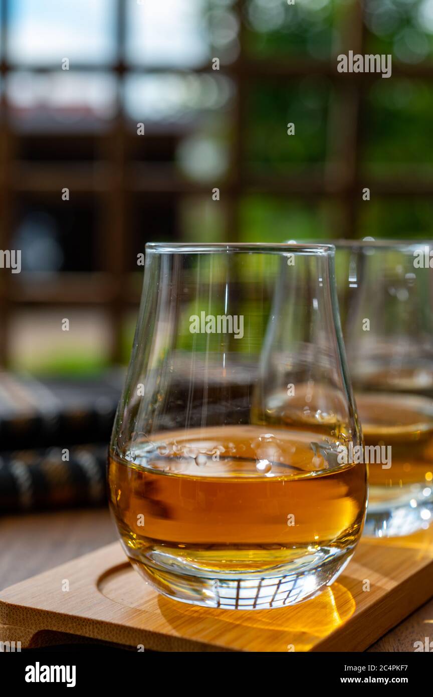 Tasting of different Scotch whisky drinks in traditional old British ...