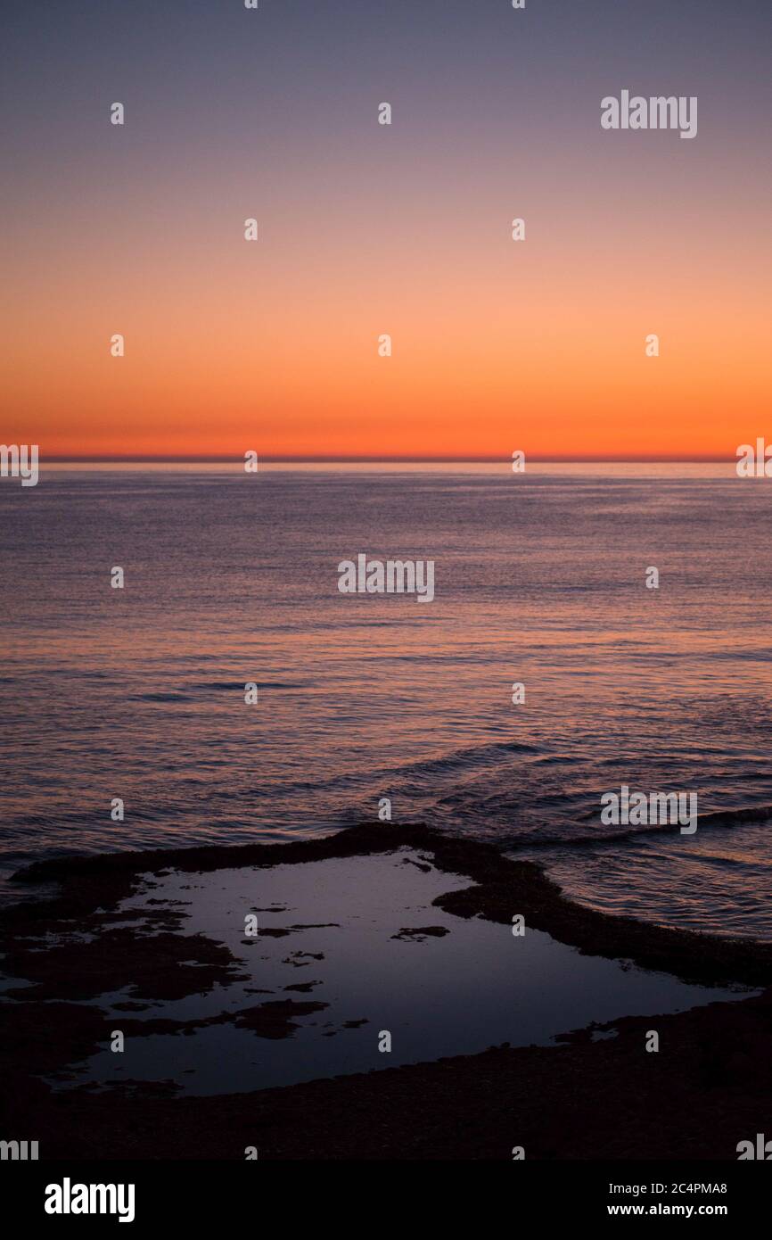 Beautiful sunrise on the beach of Valencia Stock Photo - Alamy